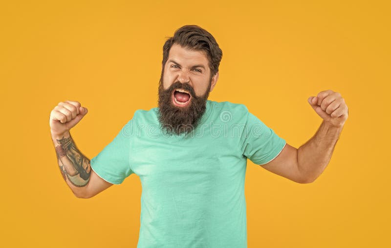 Portrait of Aggressive Brutal Man with Beard Isolated on Yellow ...