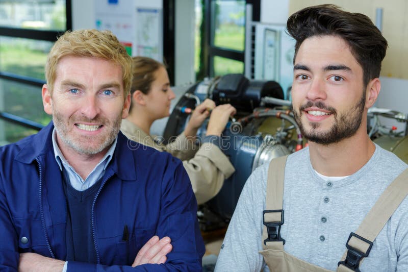 Portrait Aircraft Engineer with Apprentice Stock Photo - Image of ...