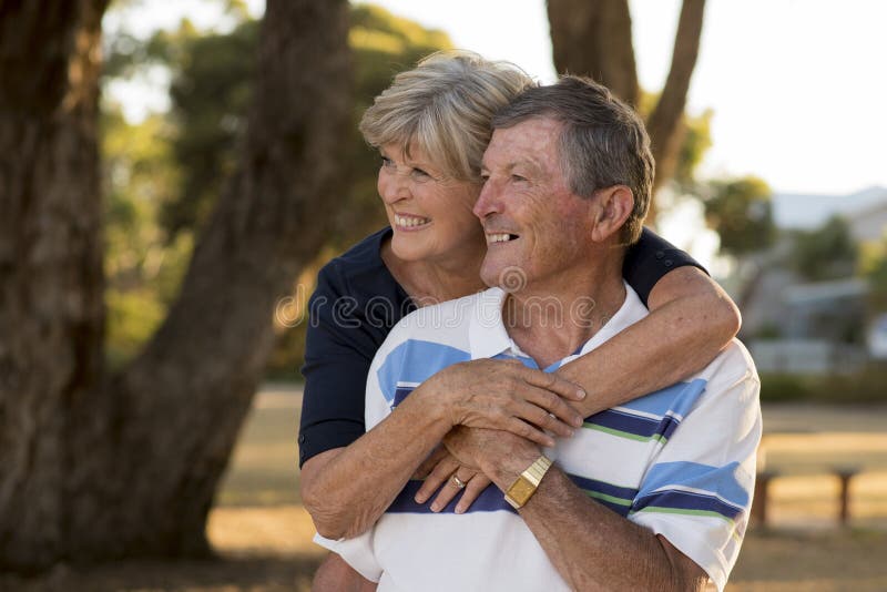 Portrait Of American Senior Beautiful And Happy Mature Couple Around 70