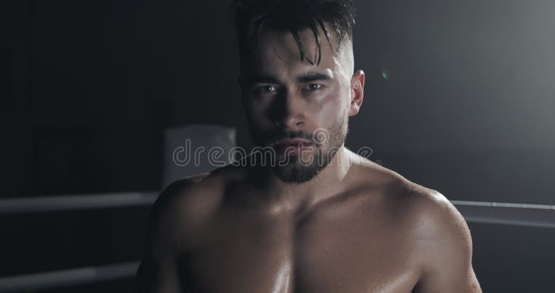 Portrait of Angry Male Boxer Standing on the Boxing Ring and Looking ...