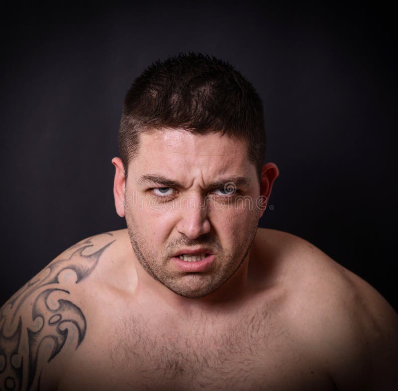 Portrait of Angry Man Against Dark Background Stock Photo - Image of ...