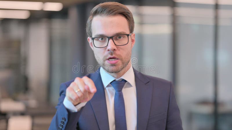 Portrait of Angry Young Businessman Arguing, Fighting Stock Photo ...
