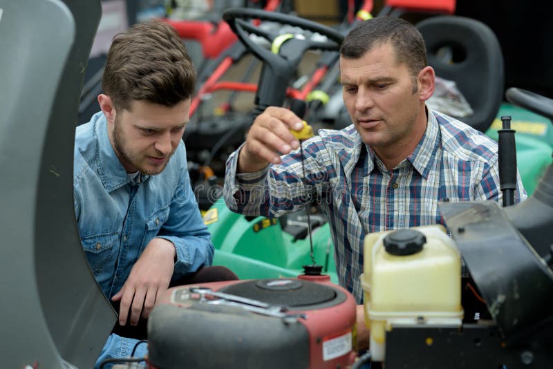 Portrait Apprentice Checking Lawn Mower Stock Image - Image of yard ...