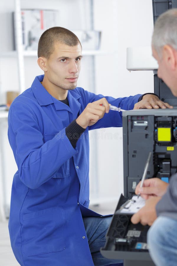 Portrait Apprentice Fixing Printer Stock Photo - Image of male, open ...