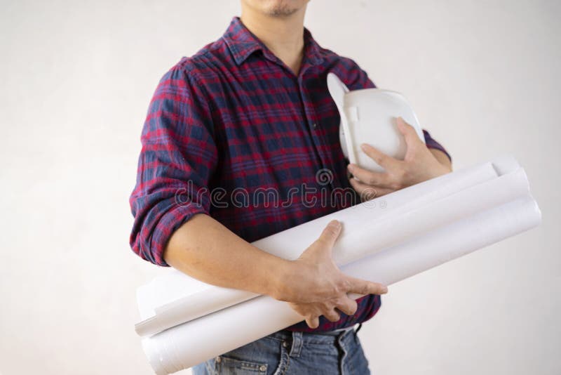 Portrait of an Architect Builder Studying Layout Plan of the Rooms ... Portrait of an Architect Builder Studying Layout Plan of the Rooms ...