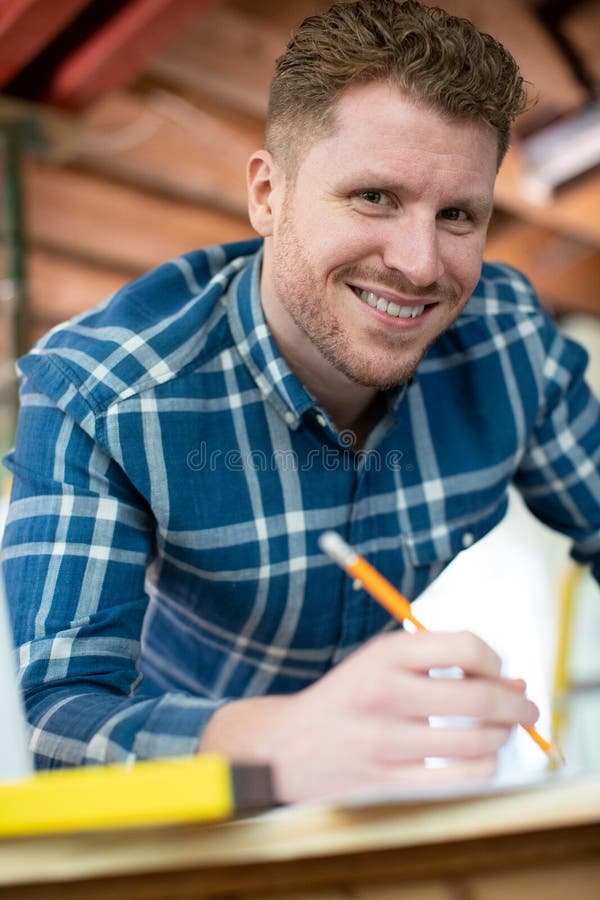 Portrait of Architect Inside House Being Renovated Working on Plans ...