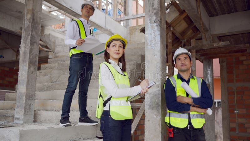 Portrait of Architector and Engineers Team in Helmets Standing at ...