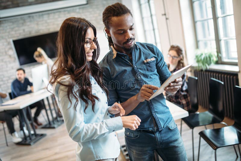Portrait of Architects Having Discussion in Office Stock Photo - Image ...