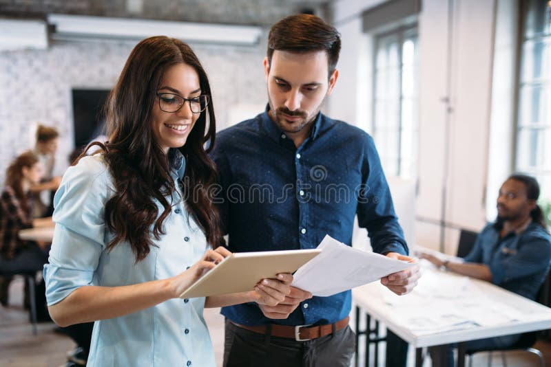 Portrait of Architects Having Discussion in Office Stock Image - Image ...