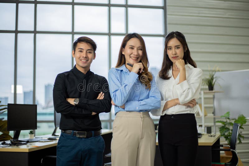 Portrait of Asian Business Team Smiling and Looking at Camera Stock ...
