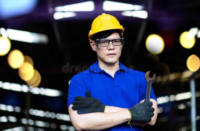 Portrait Asian Engineering Man in an Industrial Manufacturing Facility ...