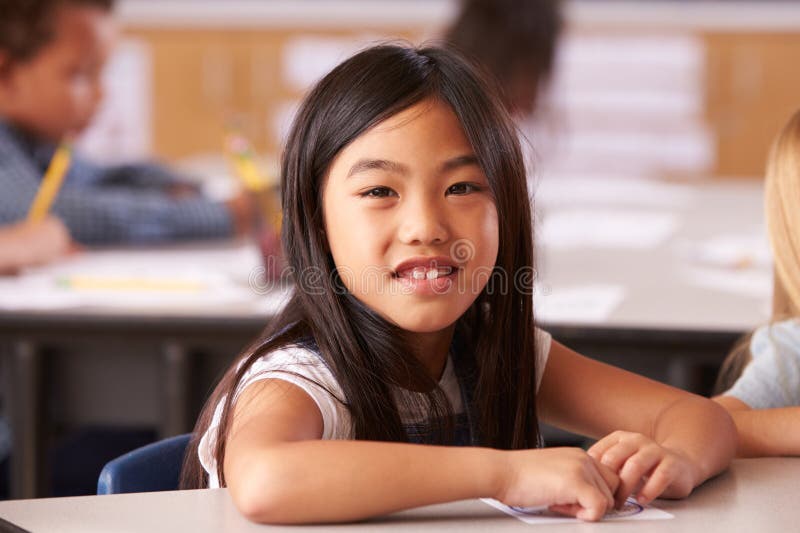 Girl at Elementary School Lunch Table Smiling To Camera Stock Photo ...
