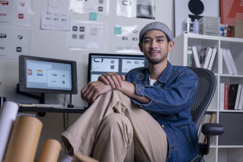Portrait of Asian Man Graphic Designer Sitting and Smiling while ...