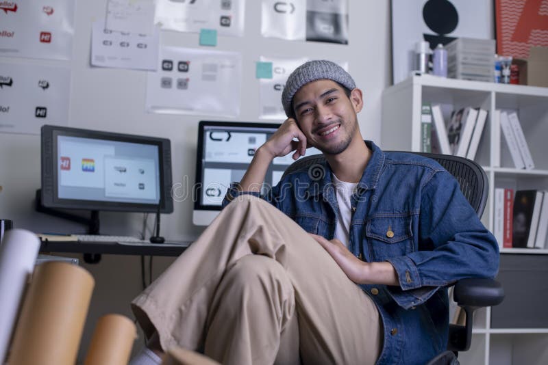 Portrait of Asian Man Graphic Designer Sitting and Smiling while ...