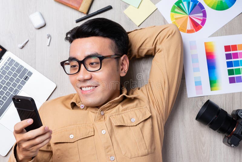 Portrait of an Asian Man Working by Himself in the Field of Design ...