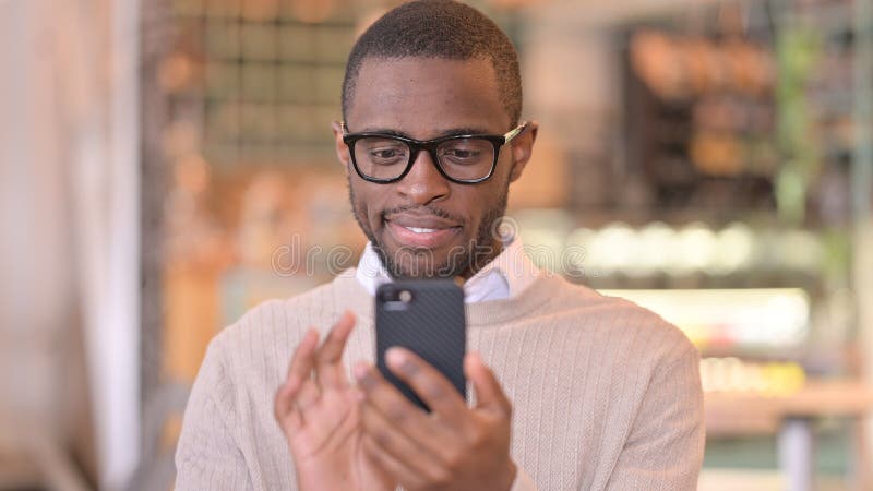 Portrait of Attractive African Man Using Smartphone Stock Image - Image ...