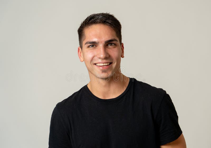 Portrait Of Attractive Cheerful Young Man With Smiling Happy Face