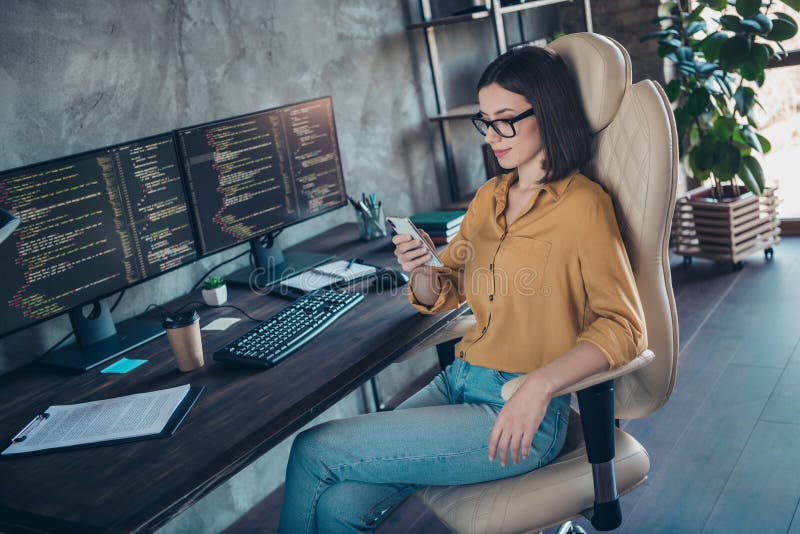 Portrait of Attractive Cheery Focused Girl Web Developer Using Device ...