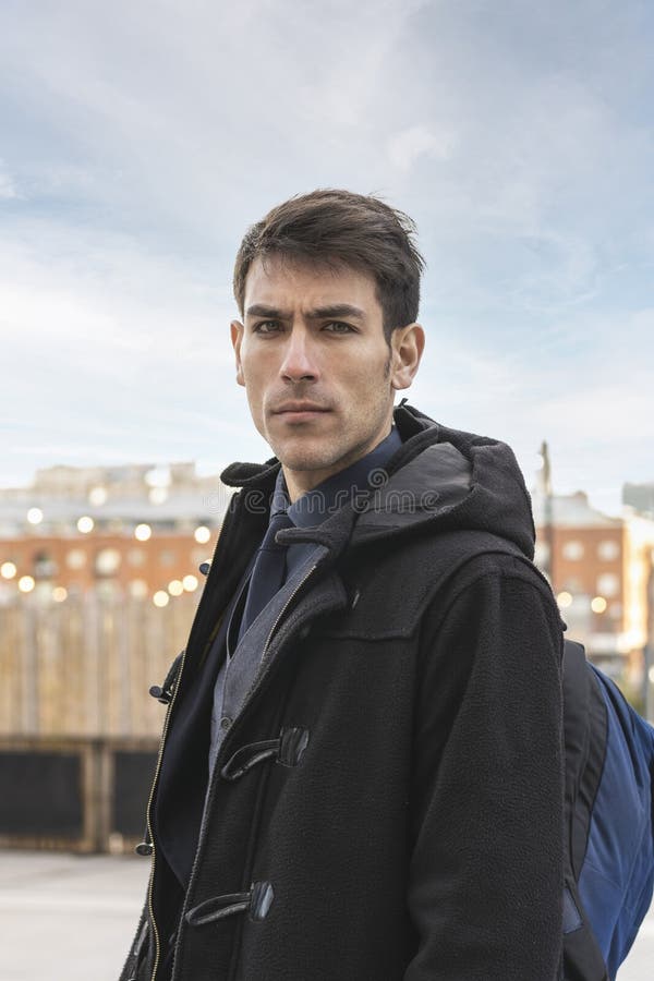 Portrait of an Attractive Man Looking at Camera Stock Photo - Image of ...