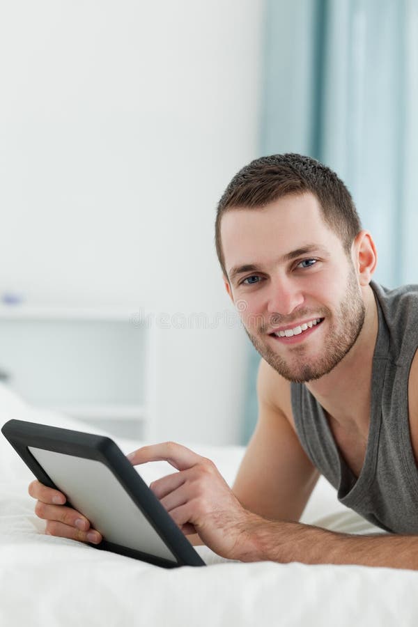 Portrait of an Attractive Man Using a Tablet Computer Stock Image ... Portrait of an Attractive Man Using a Tablet Computer Stock Image ...