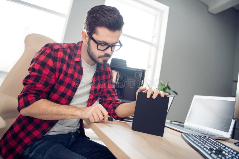Portrait of Attractive Skilled Smart Guy Technician Fixing Device Tech ...