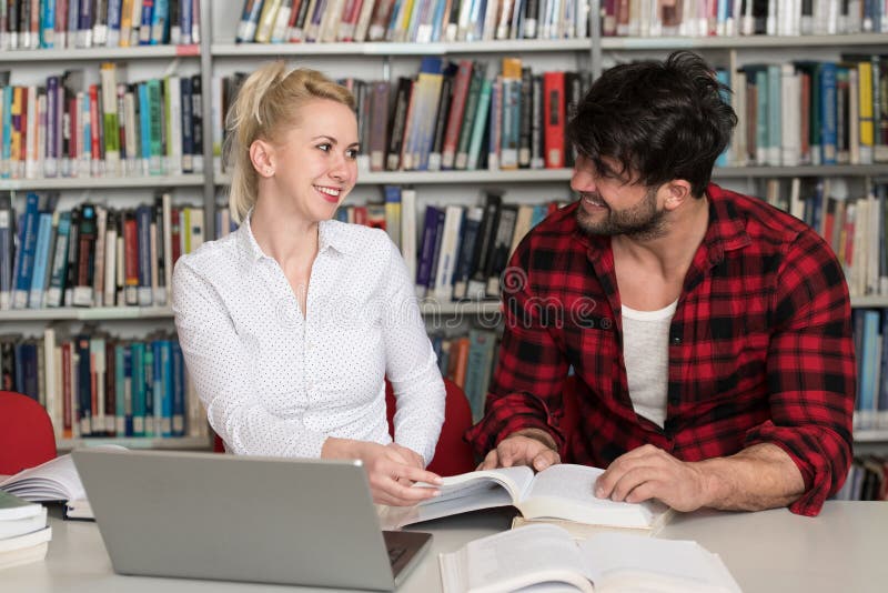 Happy Students Working with Laptop in Library Stock Image - Image of ...