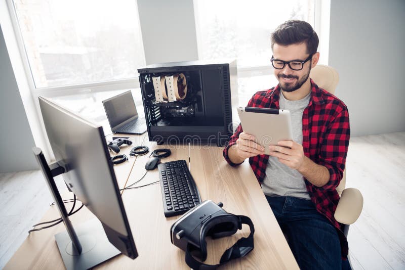 Portrait of Attractive Trendy Focused Cheerful Smart Guy Reading Tech ...
