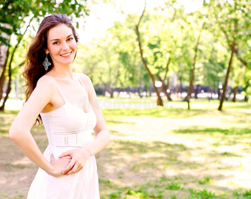 Portrait of an Attractive Woman in the Park Stock Photo - Image of ...