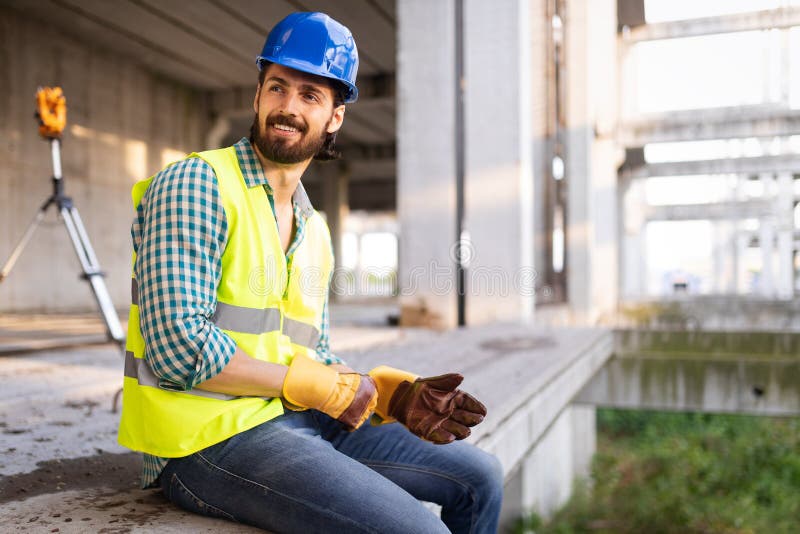 Portrait of a Handsome Worker on a Construction Site Stock Photo ...