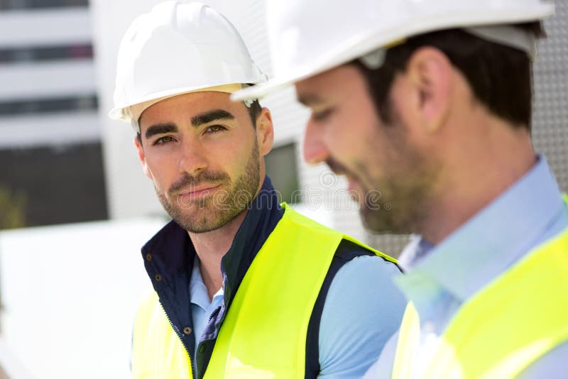 Portrait of an Attractive Worker on a Construction Site Stock Photo ...