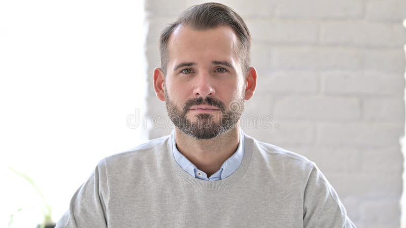 Portrait of Attractive Young Man Looking at Camera Stock Photo - Image ...