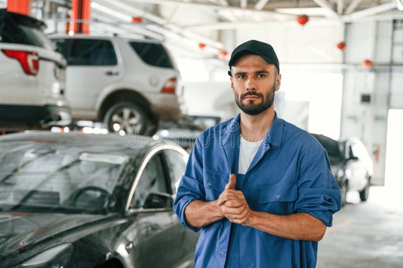 Portrait of Auto Mechanic that is in Garage. Repair Service Stock Photo ...