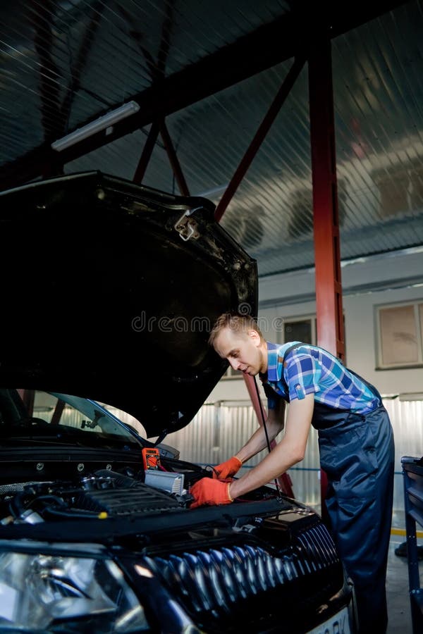 Portrait of an Auto Mechanic at Work Stock Image - Image of auto ...