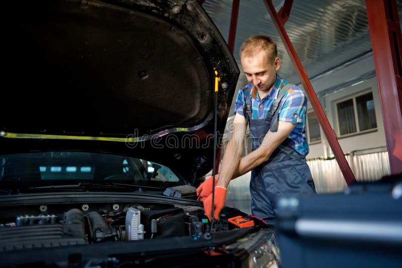 Portrait of an Auto Mechanic at Work Stock Image - Image of garage ...