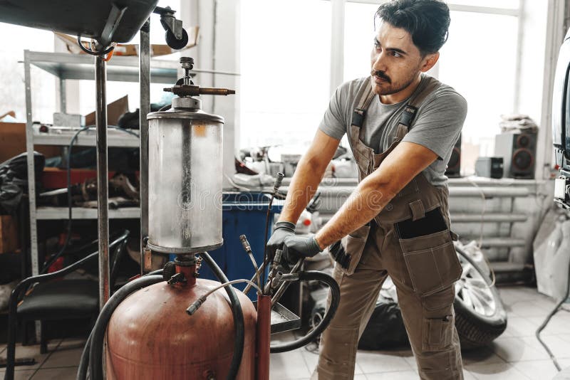 Portrait of an Automechanic at Work in Car Service Station Stock Image ...