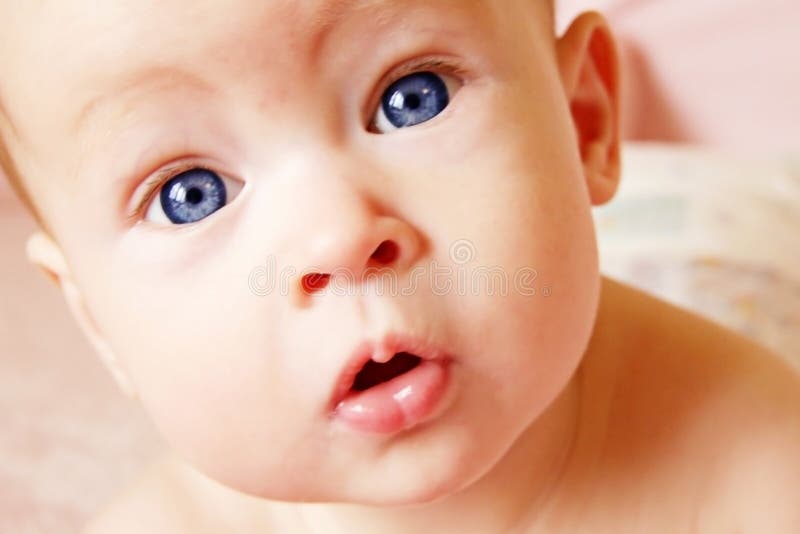 Baby boy squinting eyes stock image. Image of yucky, yuck - 18913015