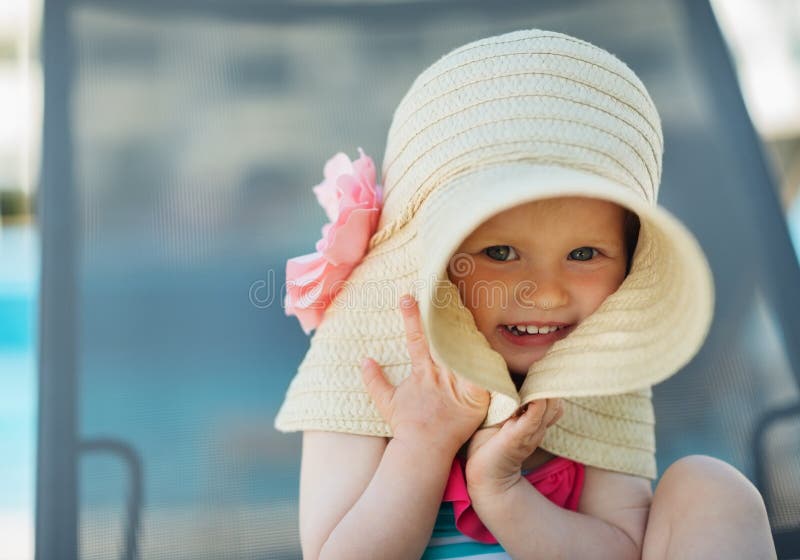 Portrait of Baby Hiding in Big Hat Stock Image - Image of portrait ...