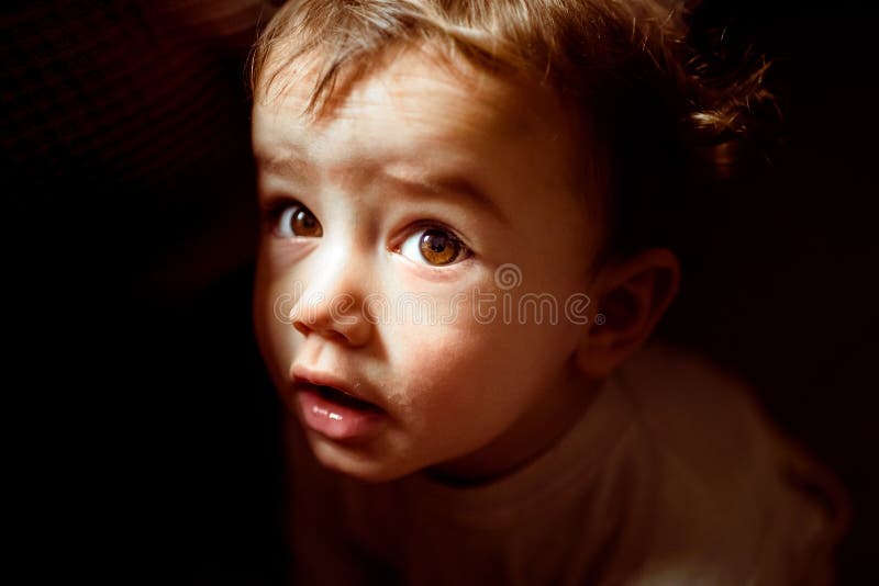 Portrait of a Baby with Intense Expression Stock Photo - Image of ...