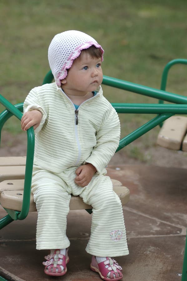 Portrait of Baby on Merry-go-round Stock Photo - Image of portrait ...