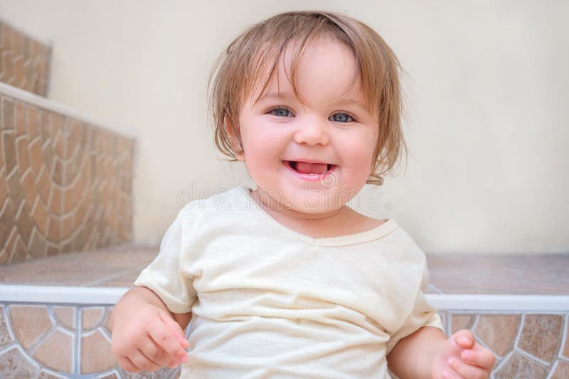Portrait baby on the steps stock photo. Image of portrait - 244940892