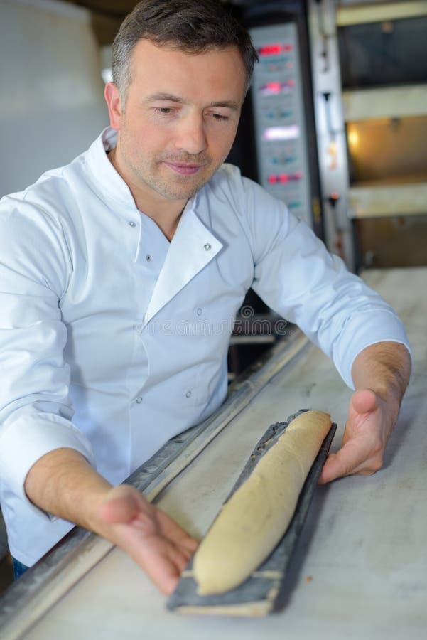 Portrait Baker with Baguette Stock Image - Image of confectioner ...