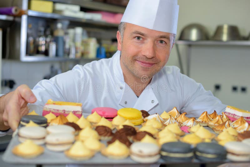 Portrait Baker Presenting Sweets Stock Photos - Free & Royalty-Free ...