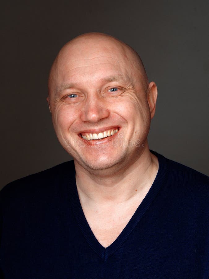 Portrait of a Bald Cheerful Man on a Black Background Stock Image ...