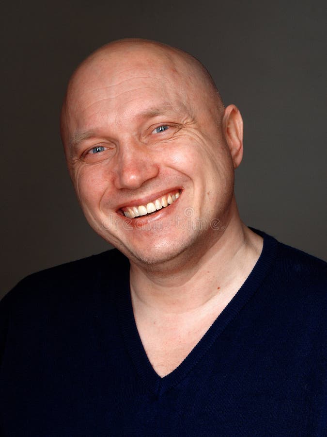 Portrait of a Bald Cheerful Man on a Black Background Stock Image ...