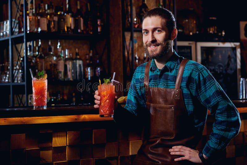 Portrait of a Barman Hipster with Beard Smiling Sitting in Bar Stock ...