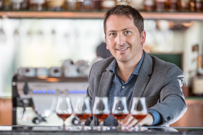 Portrait of Bartender Professional Behind the Bar Counte. Stock Photo ...