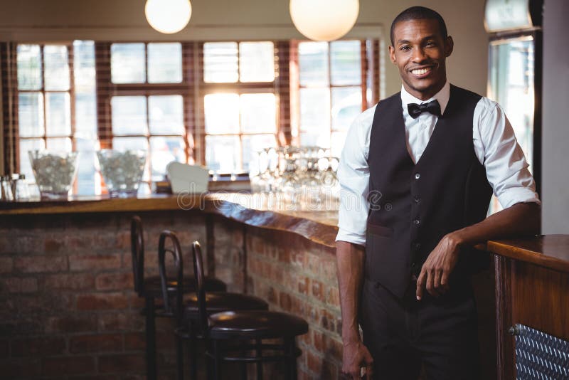 Portrait of Bartender Standing at Bar Counter Stock Photo - Image of ...