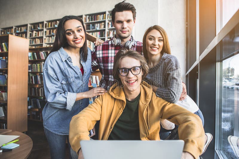 Satisfied Students Girl is Showing Thumb Up while Sitting on Grass ...