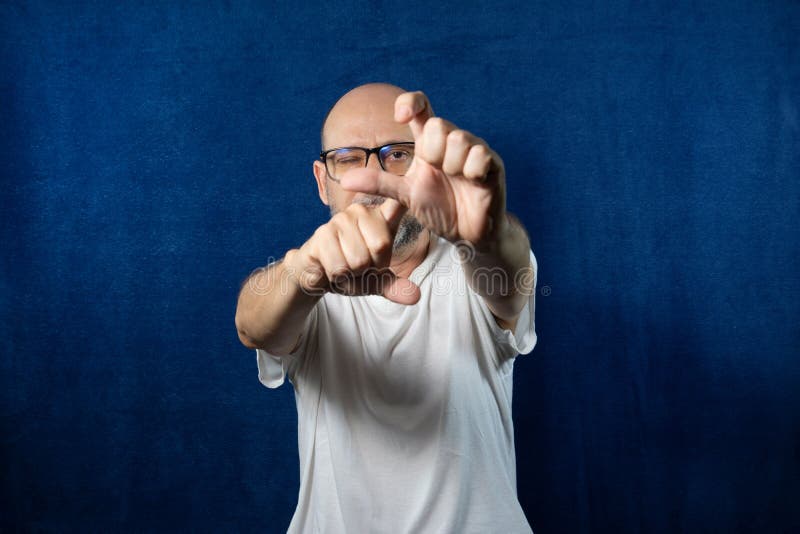 Portrait of a Bearded Bald Man Imitating Something with His Hands ...