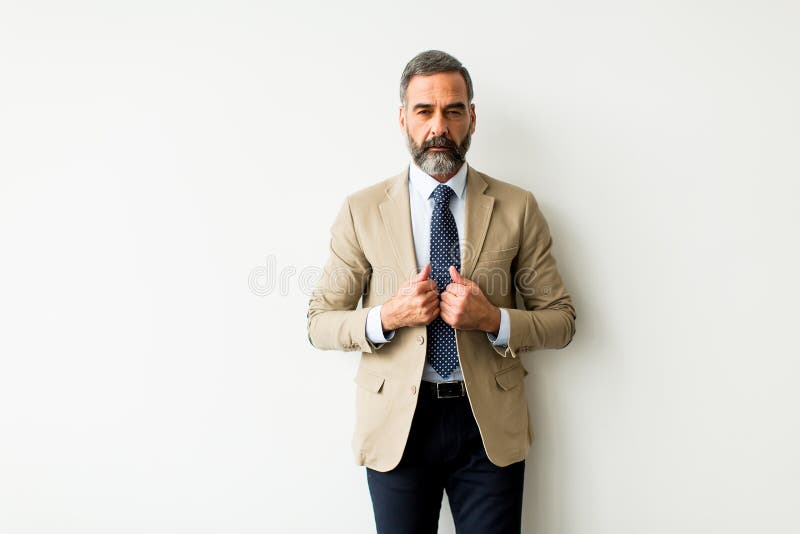 Businessman on wall stock photo. Image of handsome, alone - 4600094